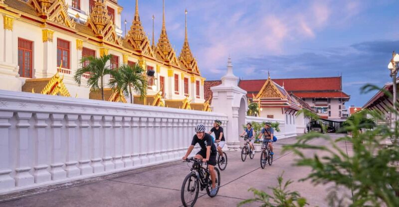 Bangkok: Night Bike Tour with Temples & Flower Market Visit - Practical Details and Tips