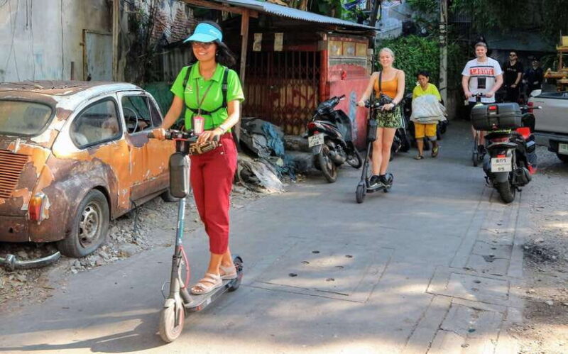 Bangkok: Riverside E-Scooter Adventure with StreetFood Snack - Itinerary Breakdown: What You’ll See and Do