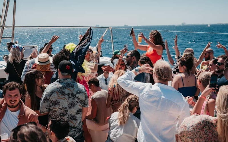 Barcelona: Charcuterie, Swim & Party Boat - Key Points
