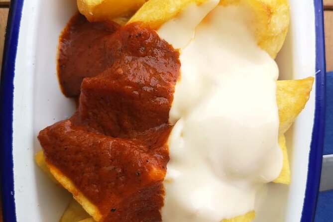 Barcelona Food Tour: Tapas, Drinks and Delights With a Local - Savoring the Local Flavors