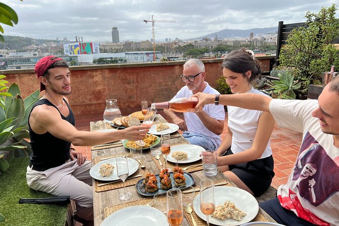 Barcelona: Rooftop Tapas & Sangria Class With a Local Chef - Host and Atmosphere