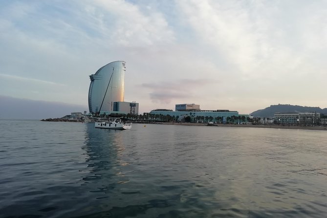 Barcelona Sailing Sunset Experience From Port Olimpic - Onboard Amenities and Hospitality