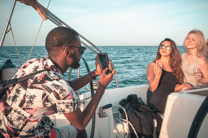 Barcelona Sunset Private Sailing With Light Snacks and Open Bar - Weather Considerations and Refund Policy