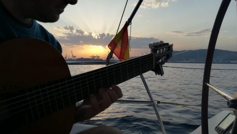 Barcelona: Sunset Sailing with Live Guitar Music and Tapas - Key Points