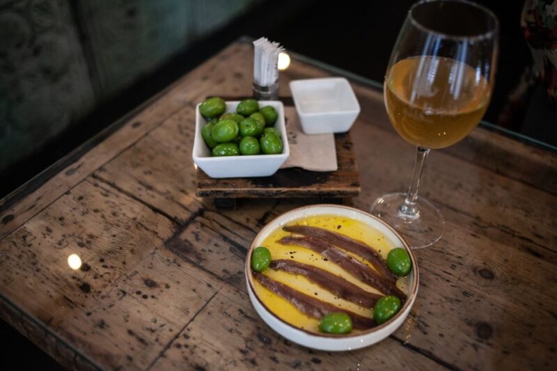 Barcelona: Tapas Food and Wine Tour in La Barceloneta - Food, Drink, and Cultural Insights