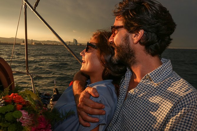 Barcelona Unique Sunset Sailing Experience with Tapas & Open Bar - Key Points