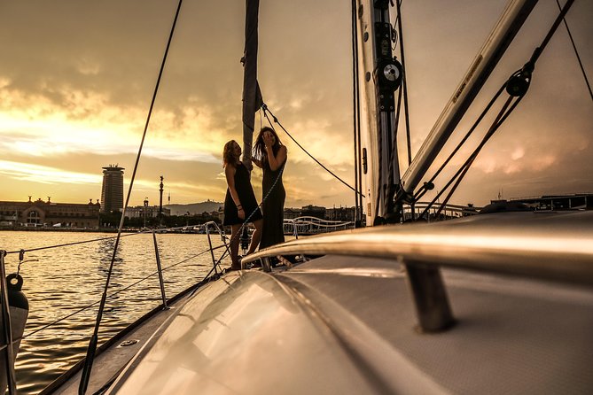 Barcelona Unique Sunset Sailing Experience with Tapas & Open Bar - The Sum Up