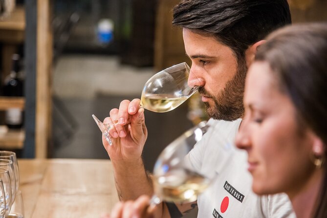 Barcelona: Wine Tasting and 5 Course Tapas Pairing Dinner - Key Points