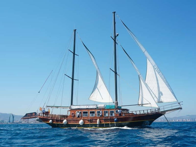 Barcelona: Wooden Boat Sailing with Tapa and Welcome Drink - Key Points