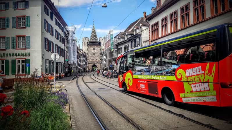 Basel: Sightseeing Bus Tour With Audio Guide - Key Points