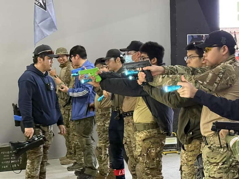 Beijing: Indoor Water Blaster Battle with Local Players - Key Points