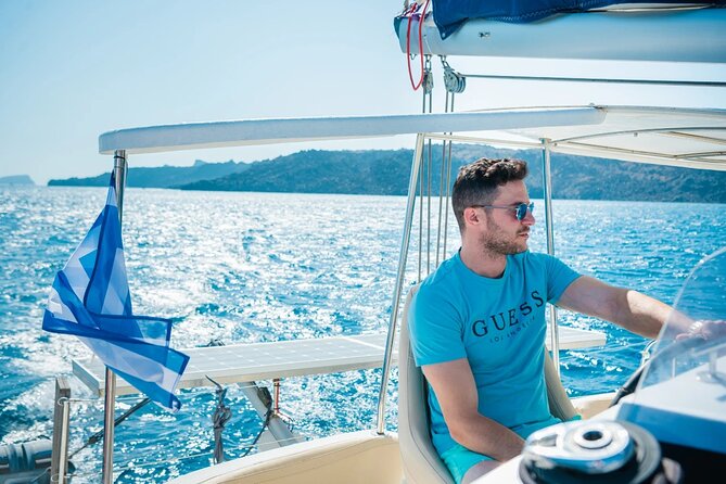 Best of Santorini Private Half-Day Catamaran Cruise With Transfer and Meal - Meeting and Pickup Information
