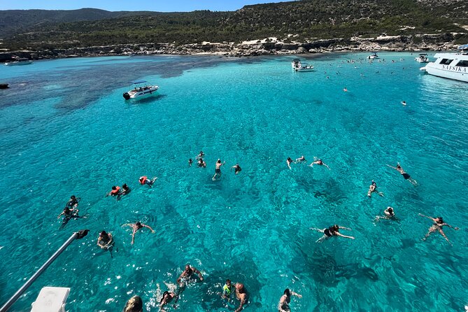 Blue Lagoon Trip With Slide & Music Departing From Latchi Harbour - Exploring the Blue Lagoon