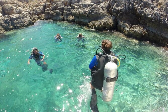Boat Trip With Guided Snorkeling and Scuba Diving in Chania - Convenient Pickup and Meeting Point
