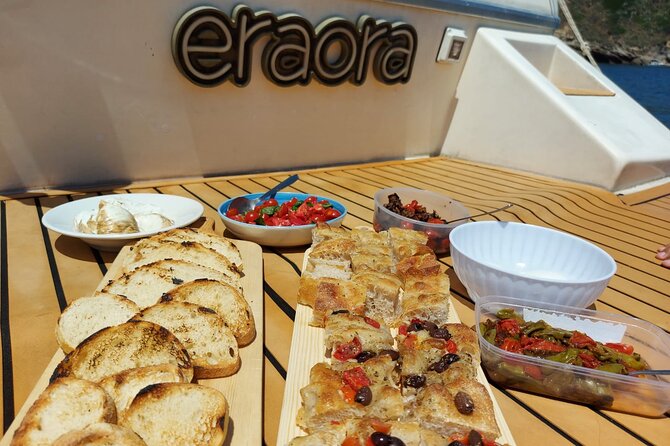 Boat Trip With Lunch or Aperitif in Procida With Eraora Boat - Confirmation and Accessibility