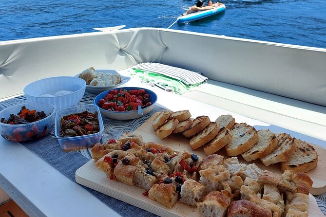 Boat Trip With Lunch or Aperitif in Procida With Eraora Boat - Highlights of the Boat Tour
