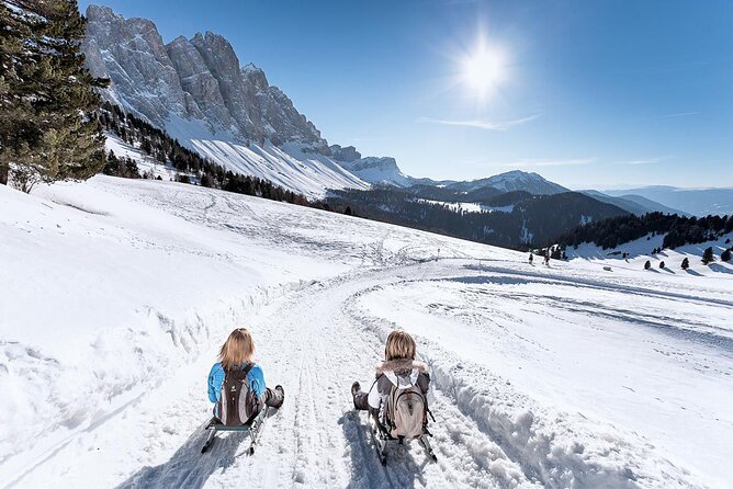 Bolzano Dolomites: Winter Hiking & Sledding Experience - Sledding Back to the Valley