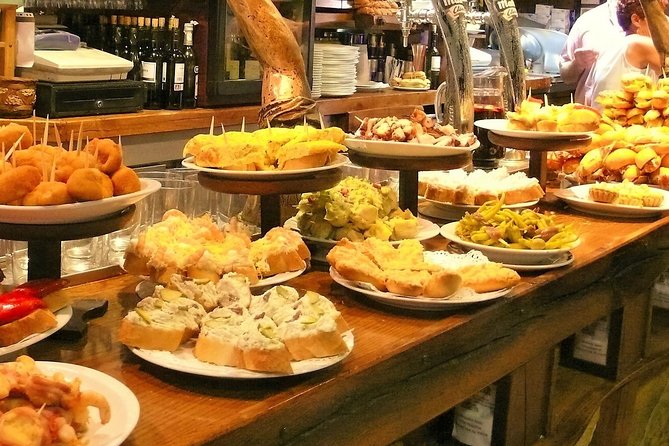 Boqueria & St Caterina Markets With Food & Tapas Small Group Tour - Tapas Experience at Local Bars