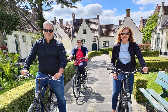 Bruges by Bike With Friends and Family! - Cycling Past Traditional Almshouses and Garden Courtyards