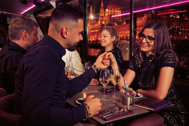 Budapest: Evening Cruise with 4-Course Dinner - Entertainment and Atmosphere