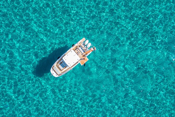 Cagliari 3 Hours Luxury Motorboat Tour - Wine and Snorkeling - Snorkeling in Crystal-Clear Waters