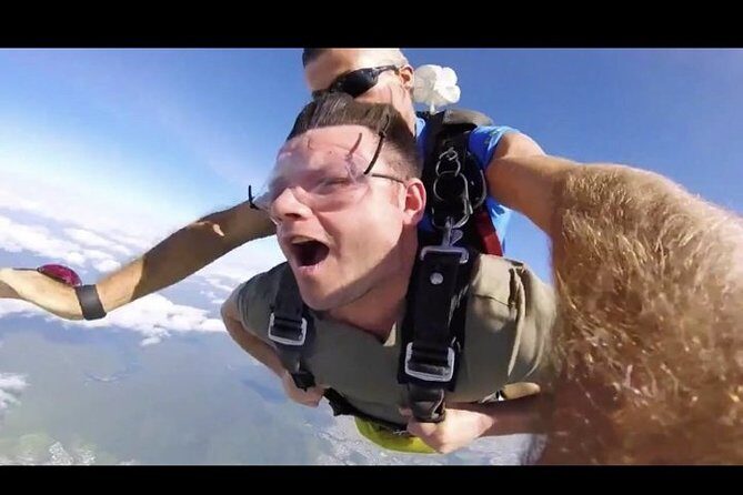 Cairns: Tandem Skydive Experience over Reef & Rainforest - Transportation, Duration, and Practicalities