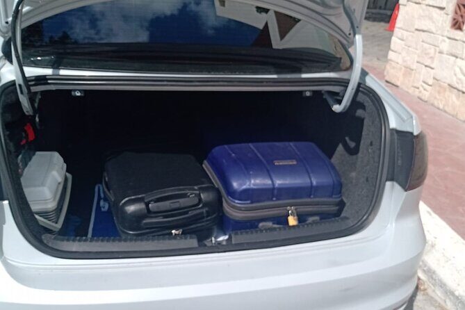 Cancun Int.Airport to The hotel zone cancun 1-3 passengers ROUNDTRIP - The Sum Up