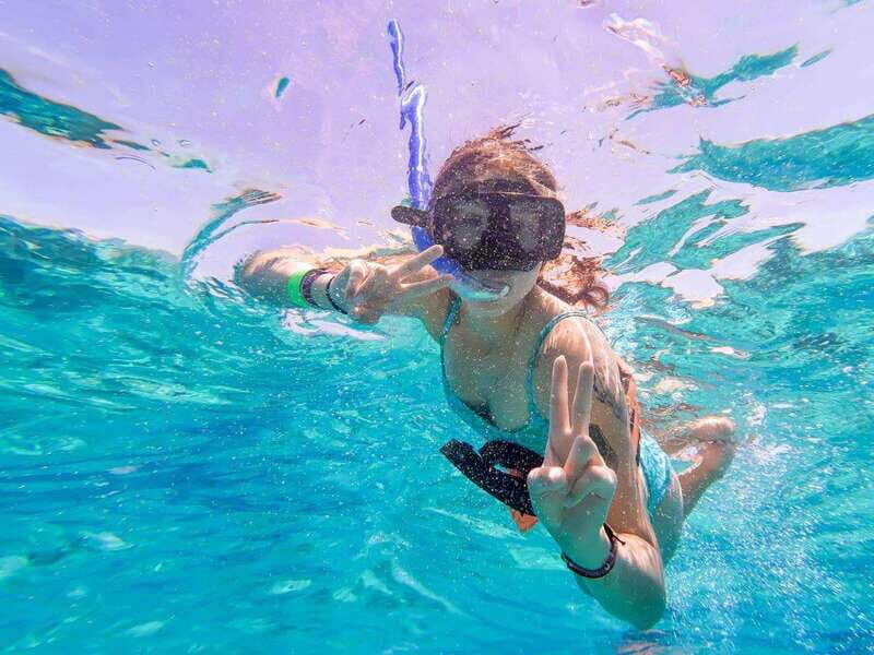 Cancun: Isla Mujeres Premium Catamaran Half-Day Tour - A Classic Caribbean Day on the Water