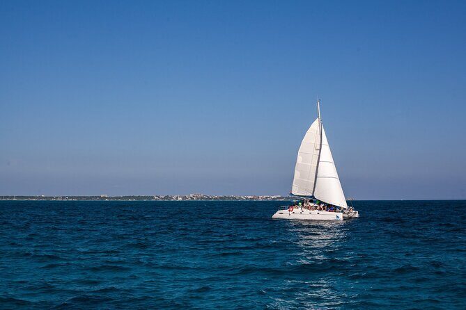 Cancun Sailing Catamaran Islas Mujeres With Luxury Beach Club - Key Points