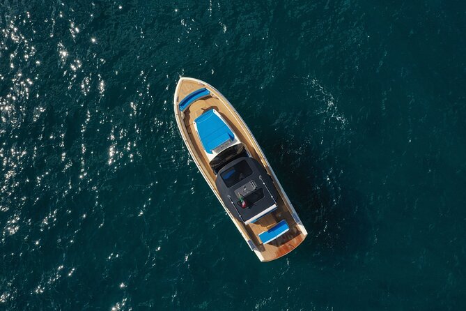 Capri: Discover the Beauties of the Island Aboard a Luxury Boat - Swim and Snorkel in Hidden Coves