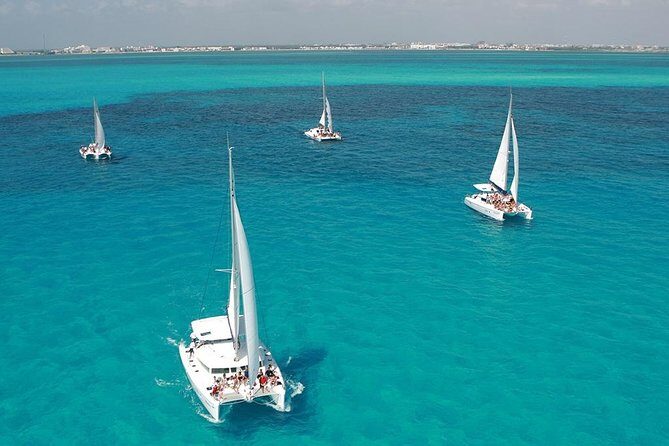 Catamaran adventure to Isla Mujeres with Snorkel,Buffet,Open Bar and Beach Club - Practical Details and Considerations