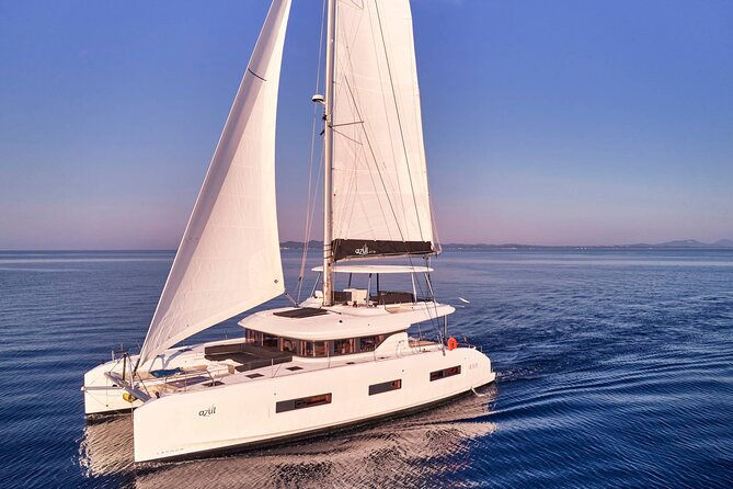 Catamaran Cruise to Dia Island with Meal and Water Activities - Key Points