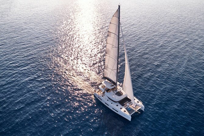 Catamaran Cruise to Dia Island with Meal and Water Activities - Relaxation and Return Journey