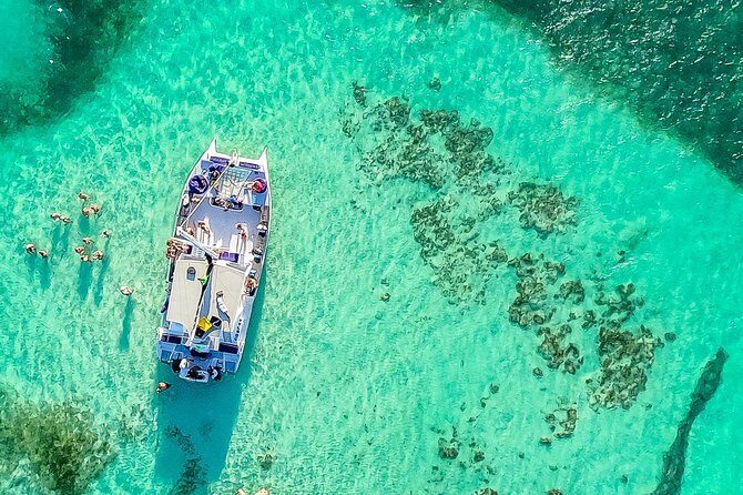 Catamaran Cruise with Snorkeling & Parasailing - The Sum Up