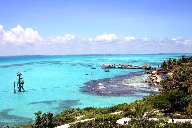Catamaran Isla Mujeres Tour with Hotel Pick Up included - Key Points