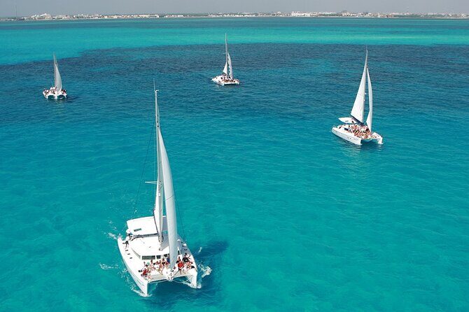 Catamaran Plus Reef Snorkeling and Isla Mujeres Visit - Key Points