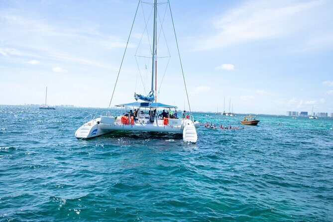 Catamaran Sailing Tour to Isla Mujeres with Snorkeling - Key Points