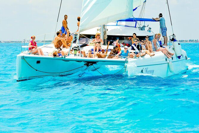 Catamaran to Isla Mujeres Snorkeling Tour with Open Bar and Lunch - The Sum Up