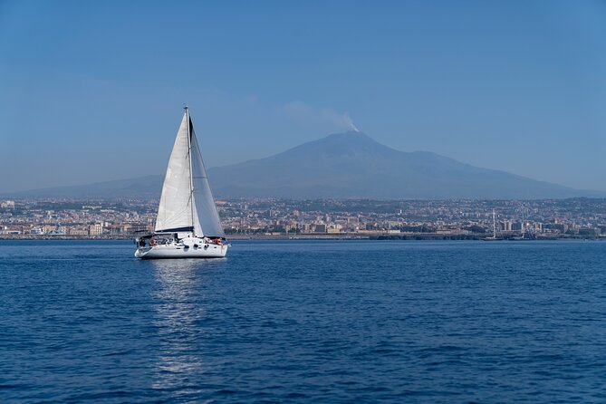 Catania Boat Tour Along the Coast With Aperitif and Snorkeling - Key Points