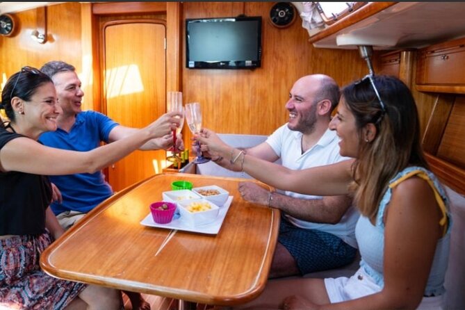 Catania Boat Tour Along the Coast With Aperitif and Snorkeling - Pricing and Cancellation Policy