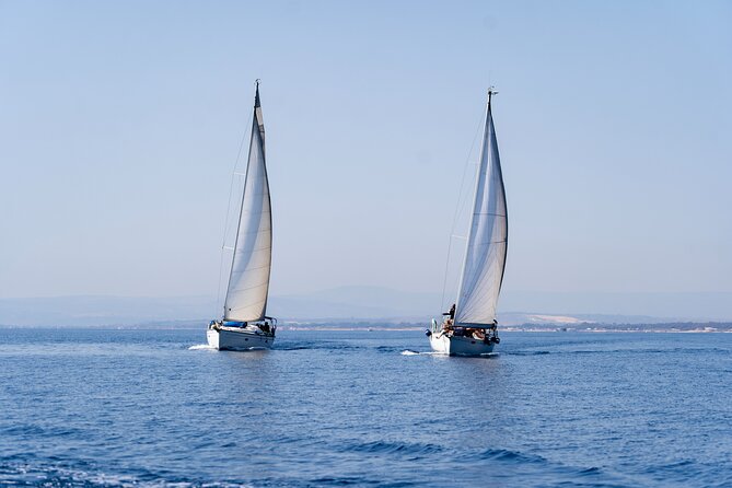 Catania Boat Tour Along the Coast With Aperitif and Snorkeling - Exploring the Catania Coastline