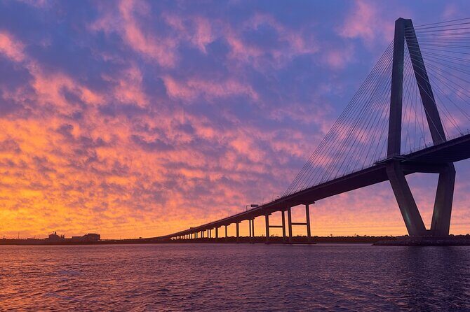 Charleston Harbor Sunset Cruise Scenic Views and Dolphin Spotting - Key Points