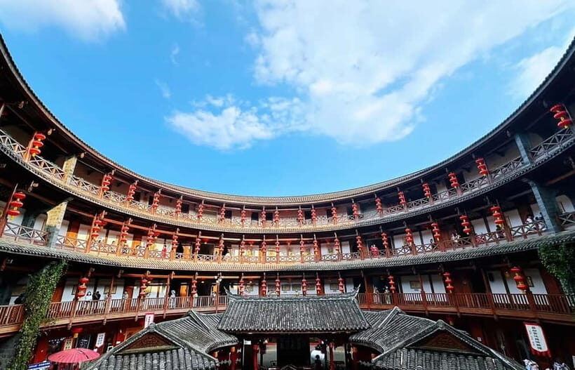 Chengdu Panda Base and Luodai Ancient Town One-Day Tour - Afternoon at Tulou Architecture and Cultural Activities