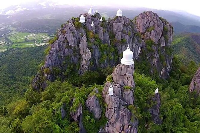 Chiang Mai Exotic Excursion Unseen Miracle of Faith To Pupadang Lampang Temple - Sacred Hilltop Walk: Wat Phra Bat Pupha Daeng
