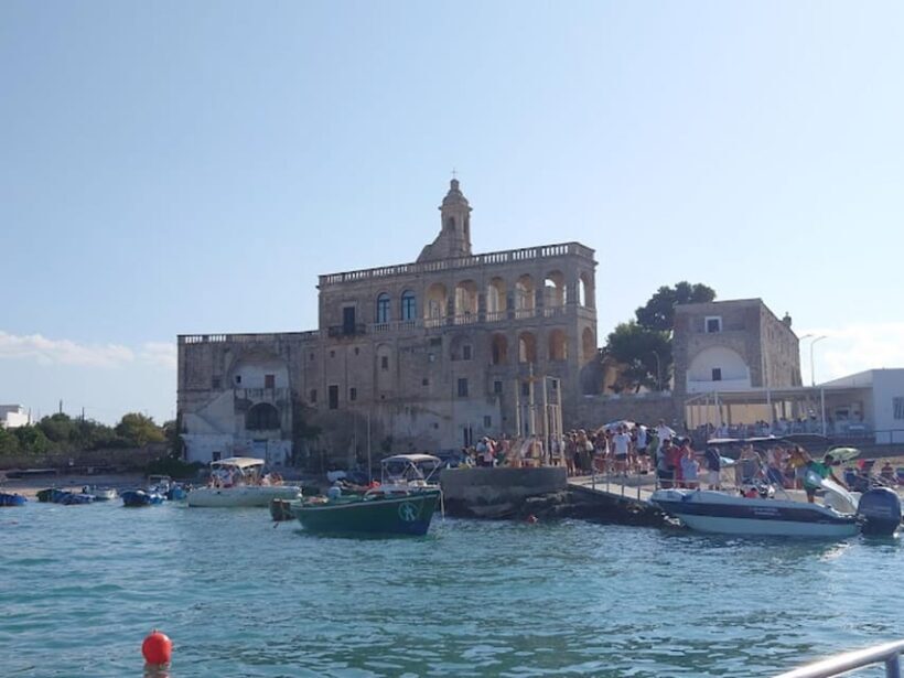 Coast and caves of Polignano:boat tours,drinks,swimming,music and fun - The Sum Up