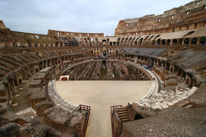 Colosseum With Arena & Roman Forum Guided Tour - Navigating the Roman Forum