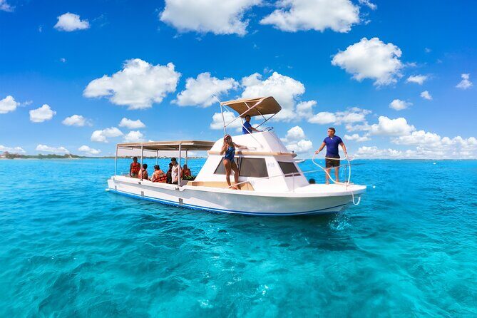 Coral Reef Snorkeling Expedition from Cancun with Beachside Lunch - Key Points