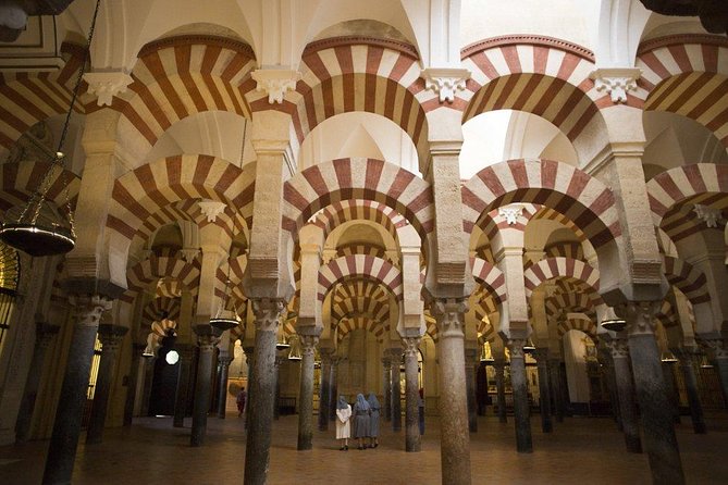 Cordoba Guided Tour With Mosque /Cathedral From Seville - Tour Inclusions and Transport Details