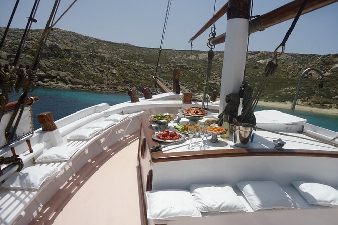 Corfu: Sunset Cruise on a Wooden Vessel With Cocktails & Bites - Atmosphere and Highlights