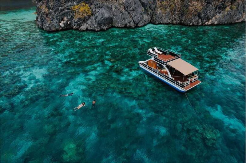 Coron Island Hopping: Private Double Deck Party Boat Slide - Practical Tips for Travelers